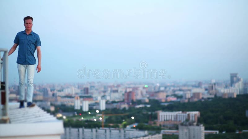 Man Walking on Roof of Handrail Back and Forth at Stock Video - Video ...