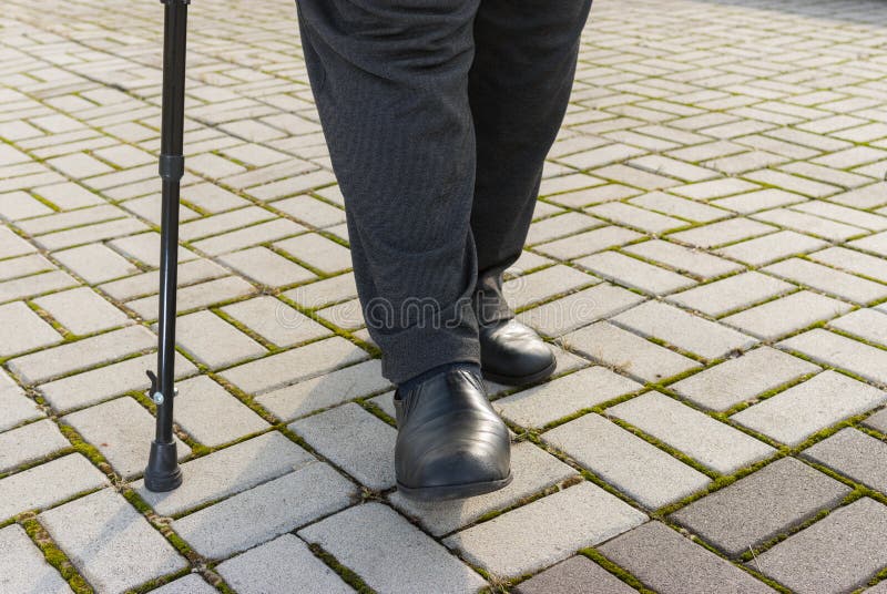 Man with Walking Stick Doing Hard Step Stock Photo - Image of chubby ...