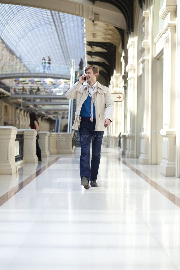 Man walking in the store stock photo. Image of portrait - 38576786