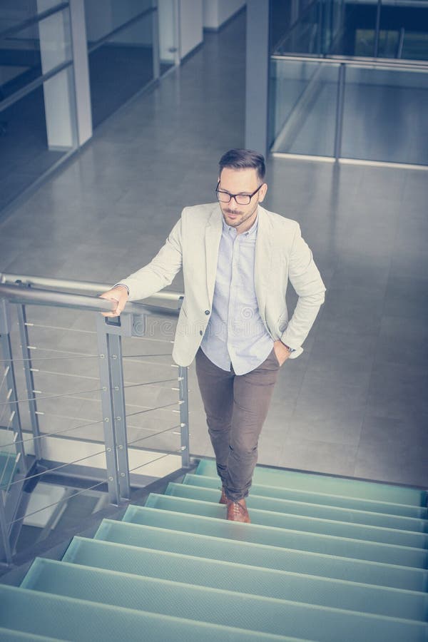 .Man Walking To Work. Business Man on Stairs. Stock Photo - Image of ...