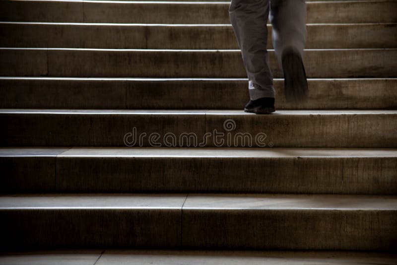 Man Walking on Stairs stock image. Image of outdoor - 251728215