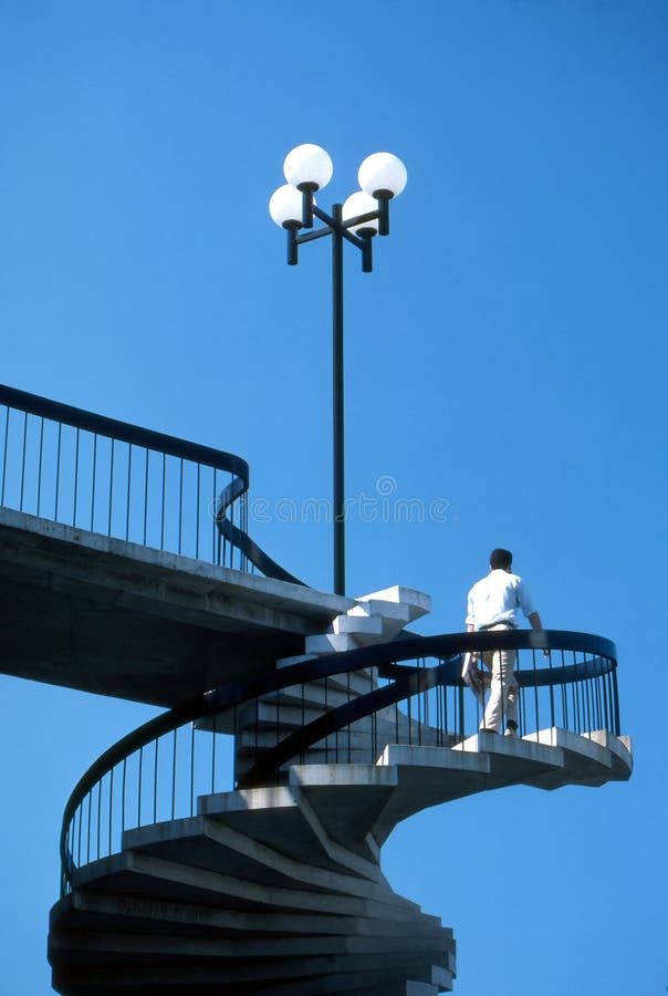 Man Walking Up Twisting Stairs Stock Image - Image of male, climbing ...