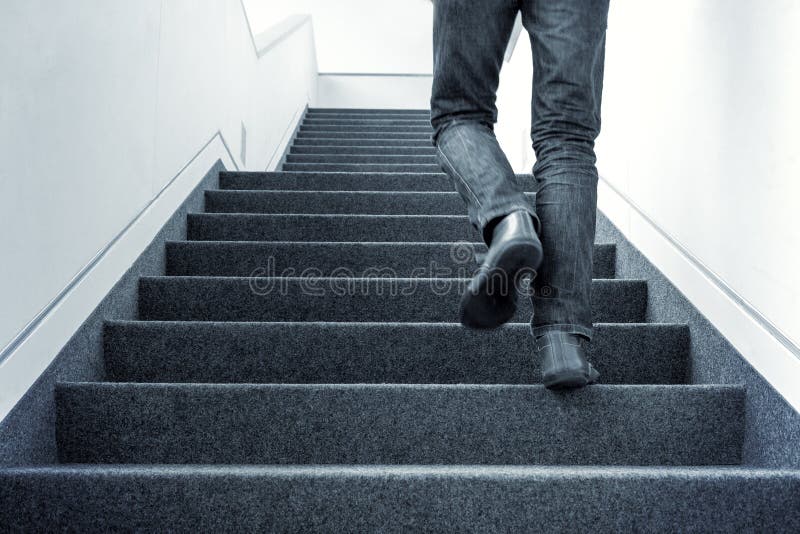 Walking upstairs indoors stock image. Image of colorized - 77856633