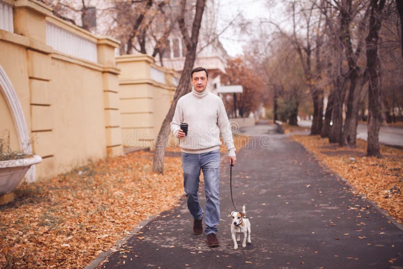 Man walks with his dog stock image. Image of walk, lifestyle - 252681097