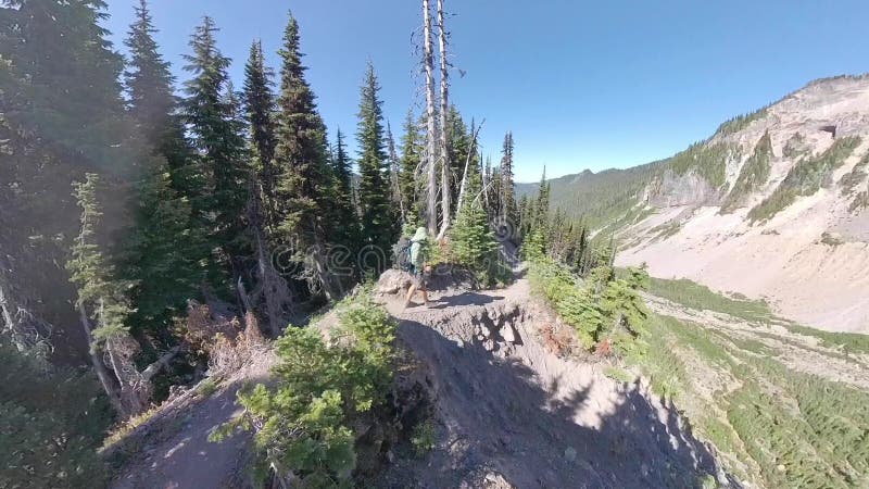 Man Walks Over Eroded Zone on Emerald Ridge Stock Footage - Video of ...