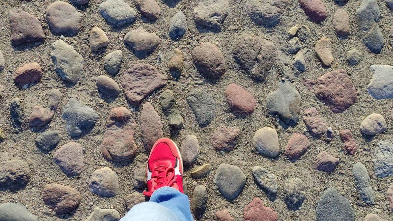Man Walks on the Paving Stones. First Person View Video Stock Photo ...