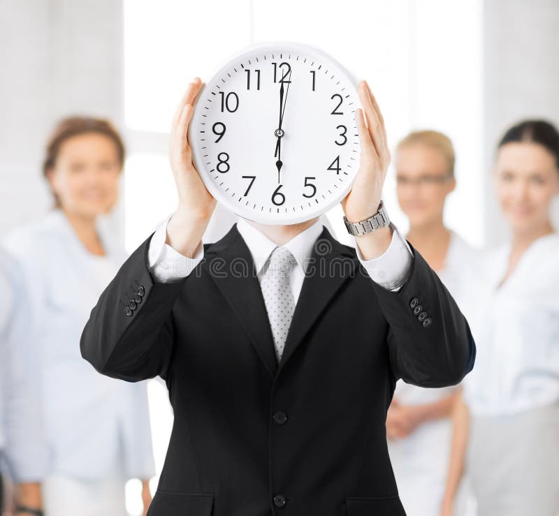 Man with wall clock stock image. Image of delayed, overtime - 38057009