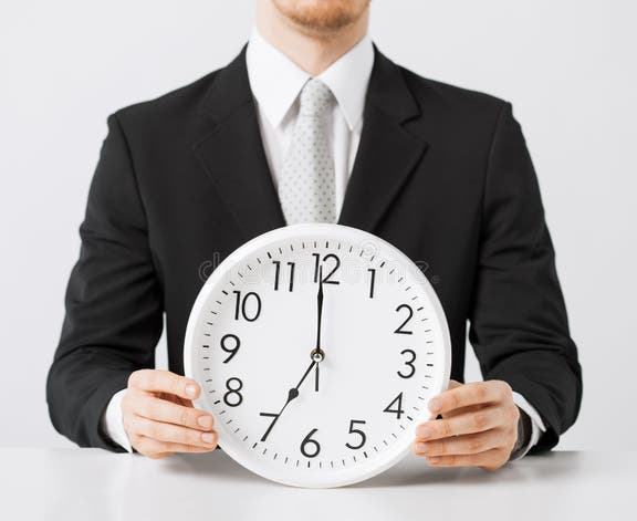 Man with wall clock stock photo. Image of corporate, second - 32285054