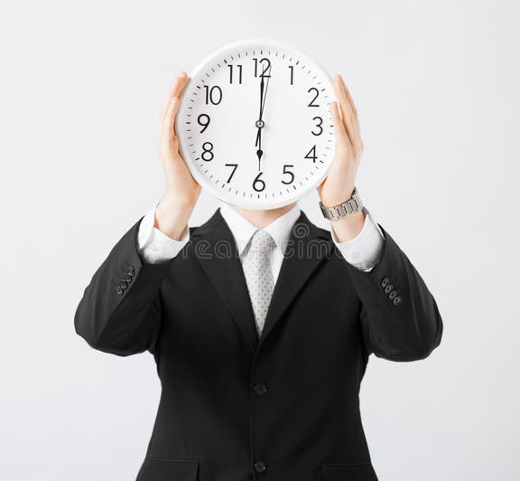 Man with wall clock stock image. Image of businessman - 32285069