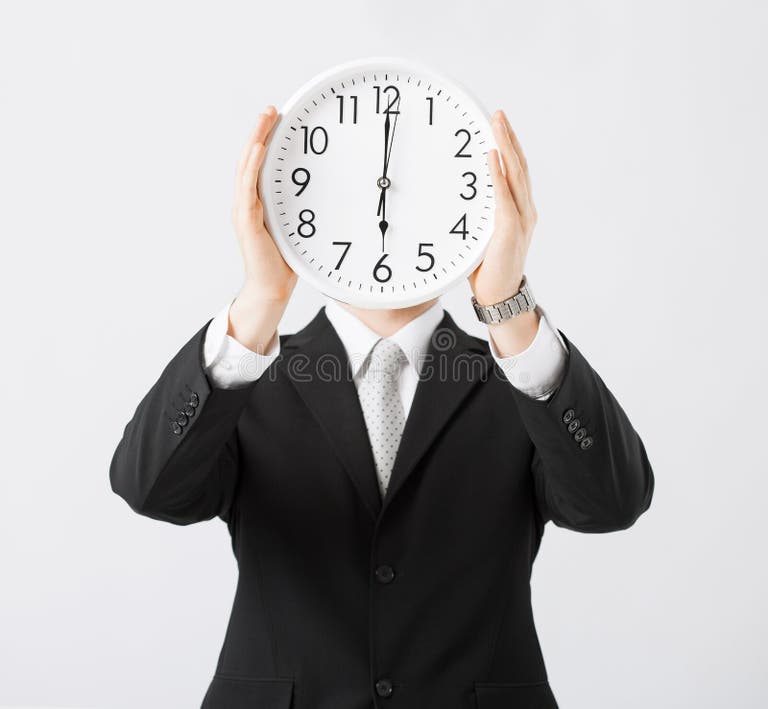 Man with wall clock stock image. Image of businessman - 32285069