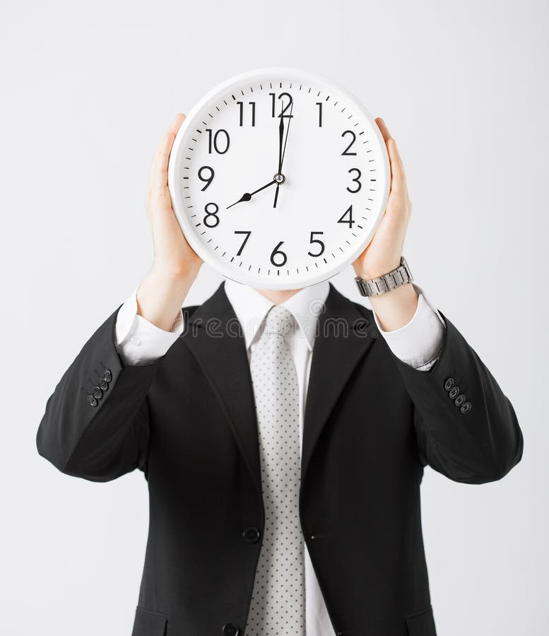 Man with wall clock stock photo. Image of routine, rushing - 38102084