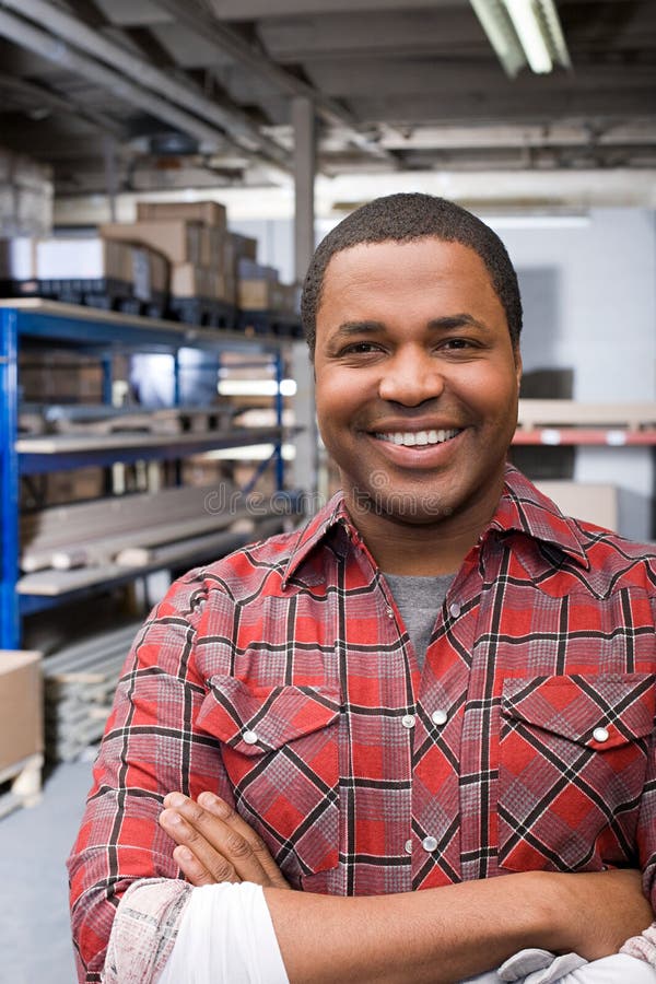 Man in warehouse stock image. Image of blue, casual, distribution ...