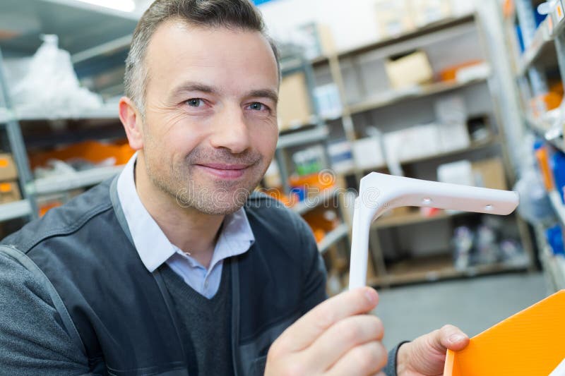 Man in Warehouse Checking Inventory Levels Goods Stock Photo - Image of ...