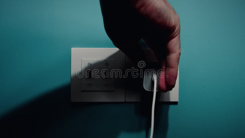 The Man Was Plugging in an Electric Appliance in His House. Stock Video ...