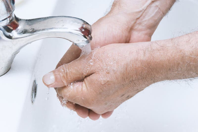 Man washes his hands stock photo. Image of male, body - 175676146