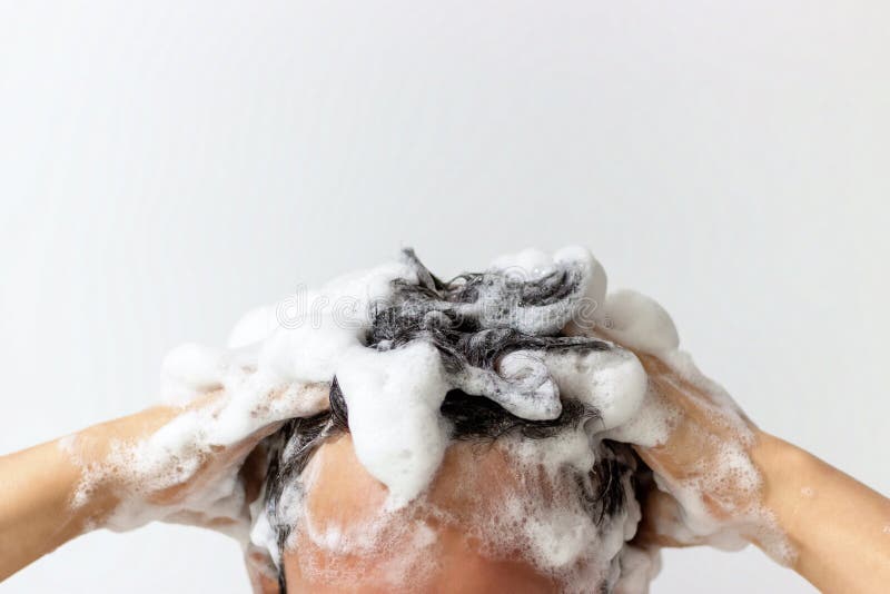 A Man Washes His Head with Shampoo on White Background, Front View ...