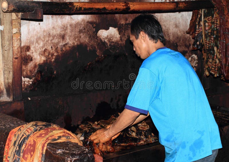 Man washing batik editorial stock photo. Image of handmade - 38378643