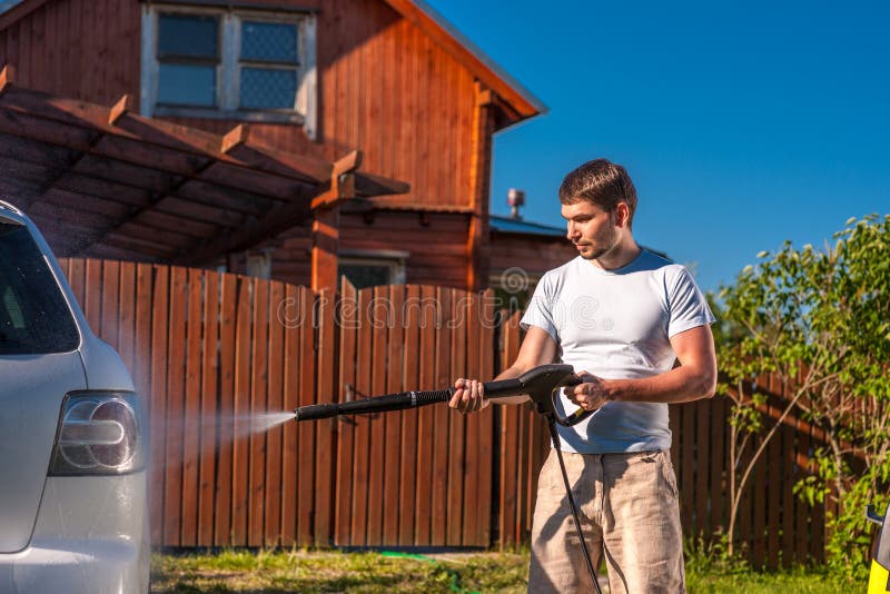 Man Washing Car in Front of House Stock Image - Image of neighborhood ...
