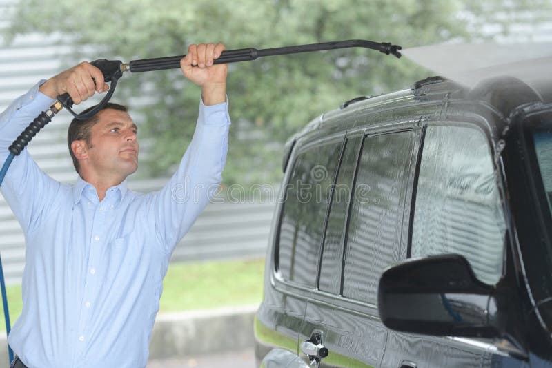 Man Washing Car with High Pressure Spray Stock Photo - Image of wash ...