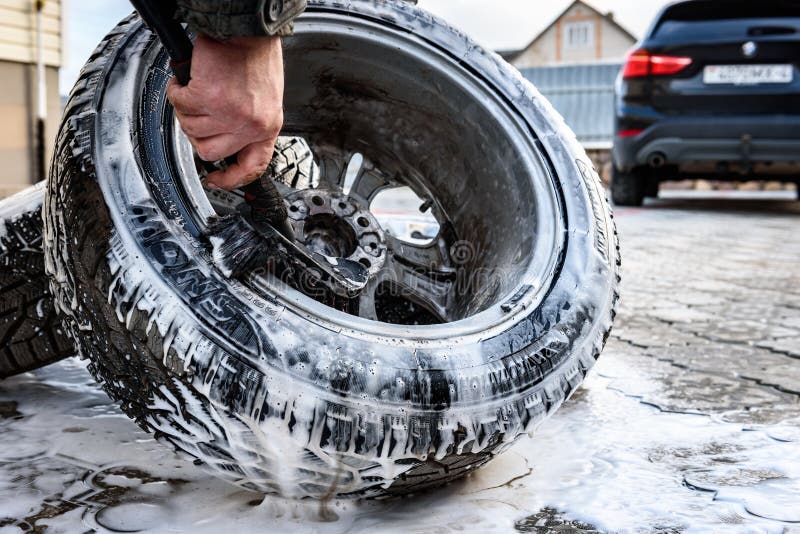 Man Washing Car S Alloy Wheels with Brush. Stock Image - Image of hose ...