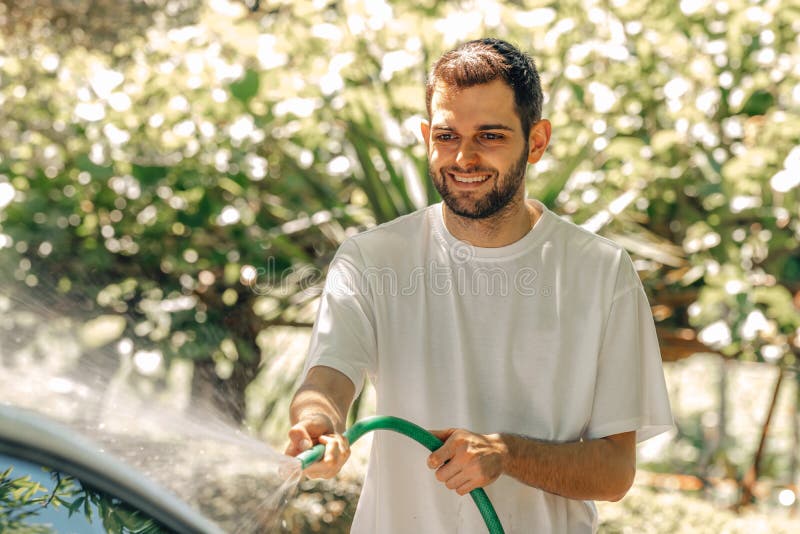 Man washing car stock photo. Image of adult, caucasian - 256047810