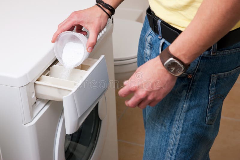 Man Washing Clothes with Machine Stock Image - Image of shirt, closing ...