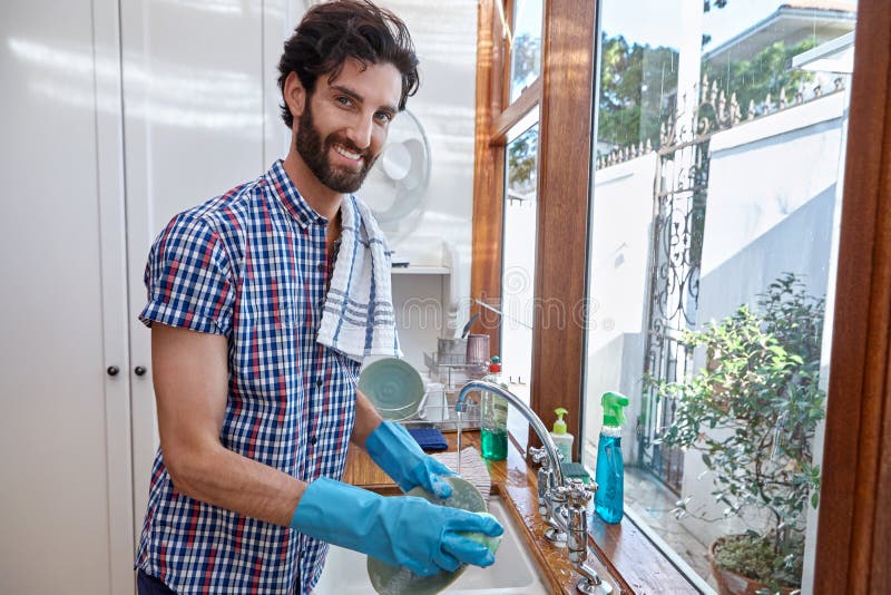Man washing dishes stock image. Image of holding, handsome - 51343631