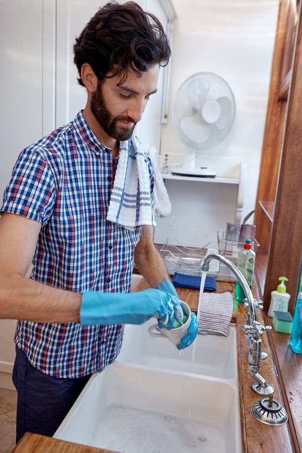 Man washing dishes stock photo. Image of life, chores - 51343776