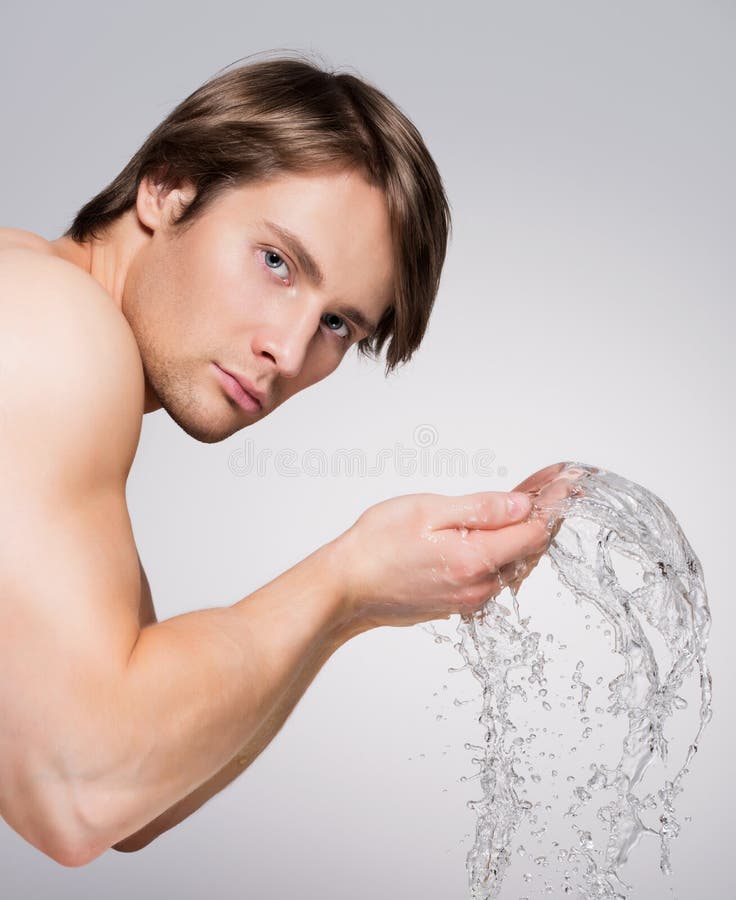 Man Washing His Face with Water. Stock Photo - Image of clean, chest ...