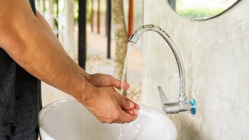 Man Washing His Hands in the Basin Stock Photo - Image of drop, close ...