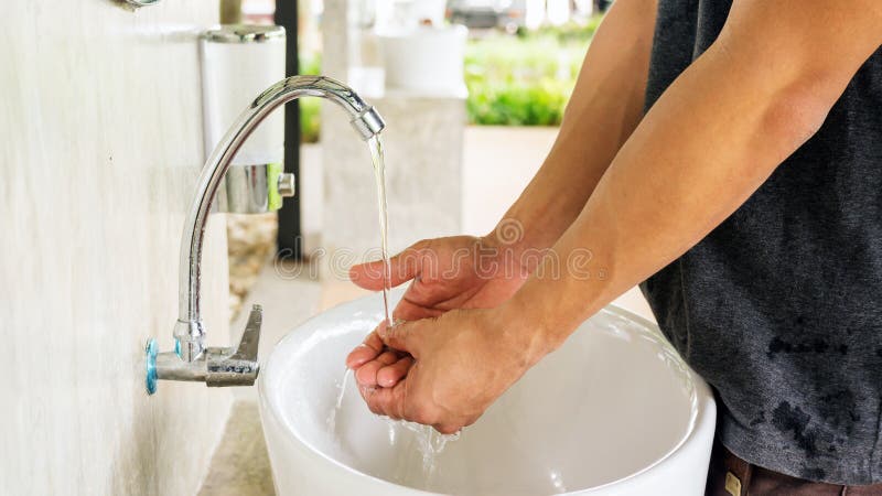 Man Washing His Hands in the Basin Stock Photo - Image of drop, close ...