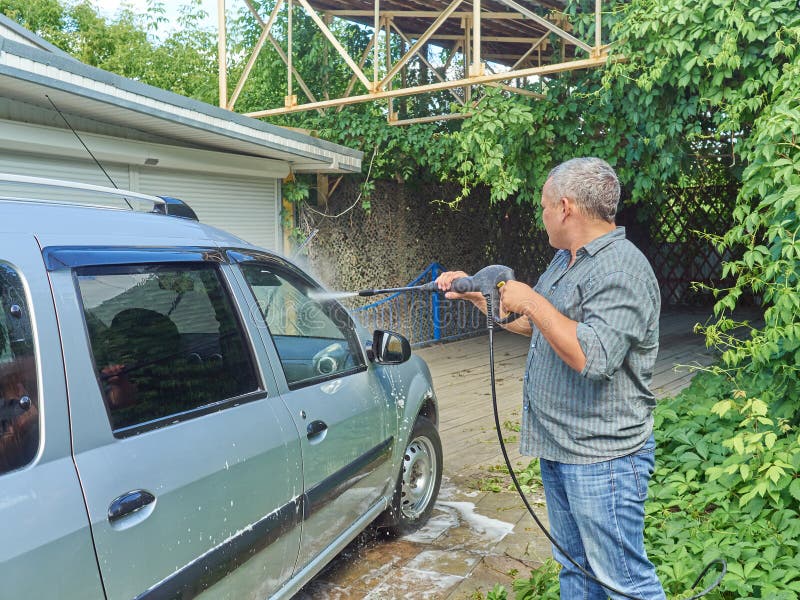 Man Washing His Silver Car Near House. Stock Image - Image of outdoors ...