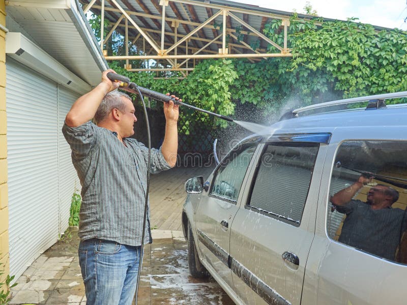Man Washing His Silver Car Near House. Stock Image - Image of outdoors ...