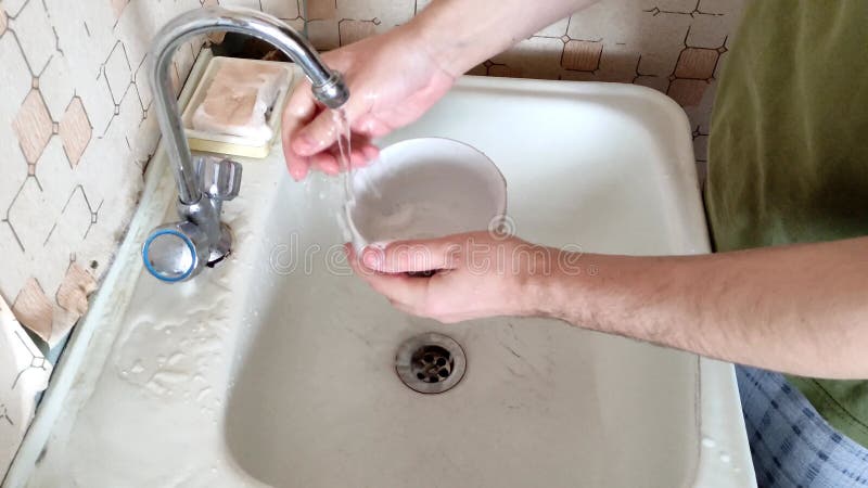 Man Washing Plate in the Sink on a Kitchen Stock Video - Video of ...
