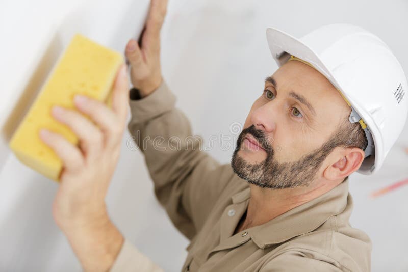 Man washing wall stock photo. Image of concrete, build - 247686878
