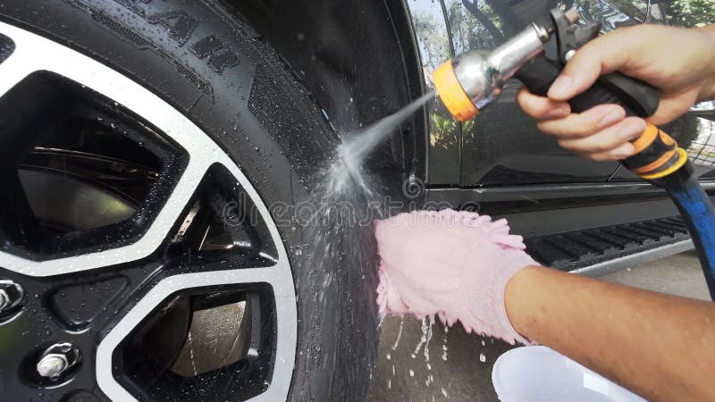 Man Washing Wheel of Suv Car at Home Stock Video - Video of home ...
