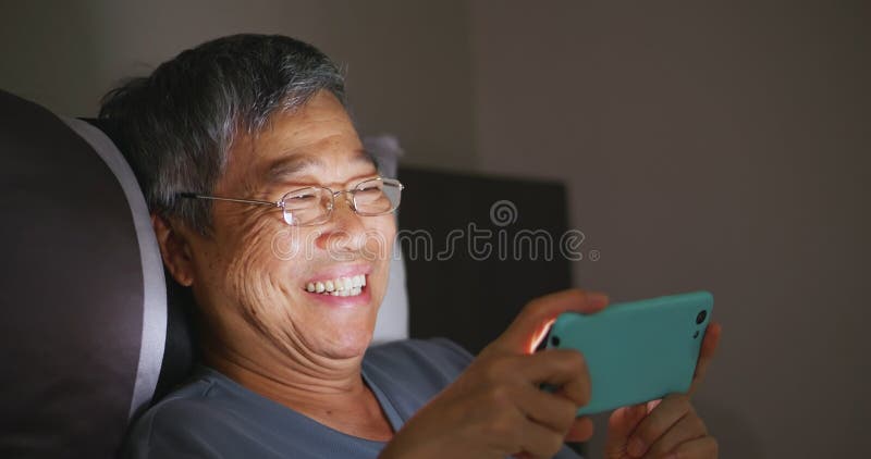 Man Watch Video with Smartphone Stock Photo - Image of japanese ...