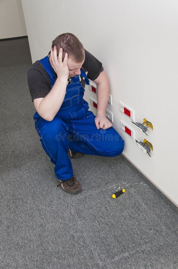 Man Watching the Electrical Socket Stock Photo - Image of construction ...