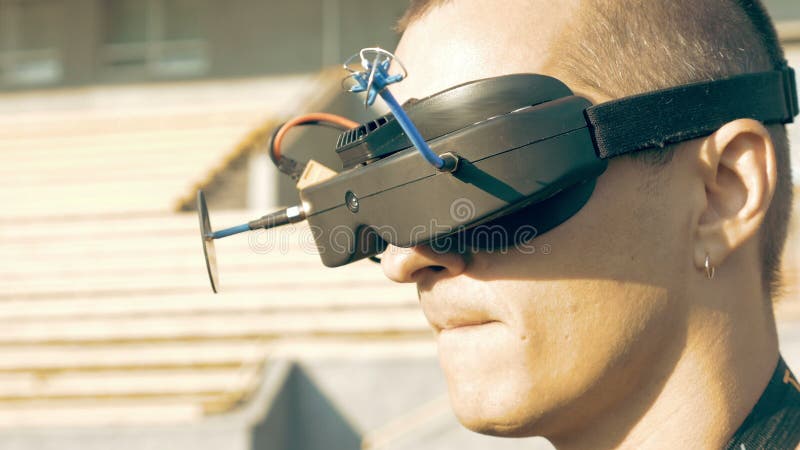 Man Watching Flight of FPV Drone Using VR Glasses Stock Footage - Video ...