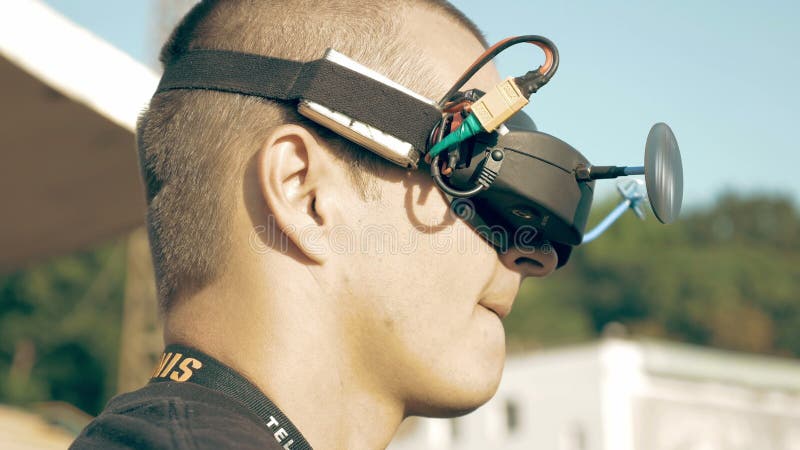 Man Watching Flight of FPV Drone Using VR Glasses Stock Footage - Video ...