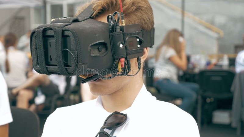 Man Watching Flight of FPV Drone Using VR Glasses Stock Footage - Video ...