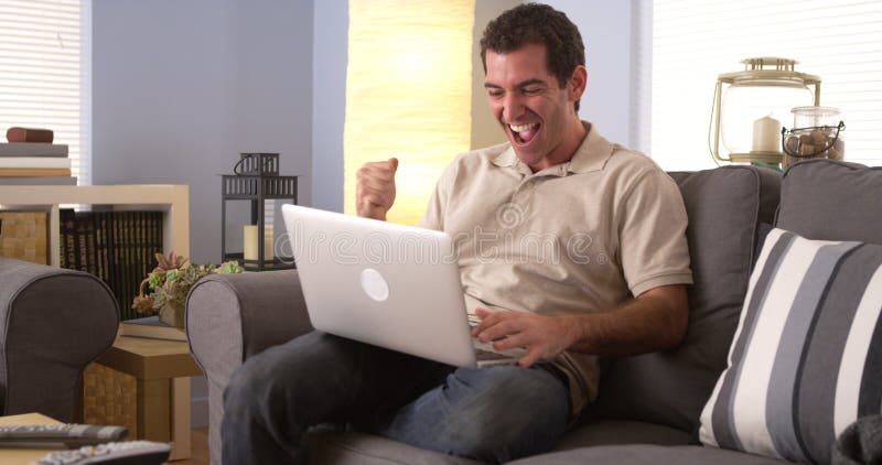 Man Watching the Game on His Laptop Stock Image - Image of adult ...
