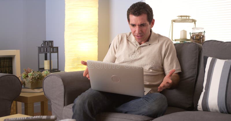 Man Watching the Game on His Laptop Stock Photo - Image of contemporary ...