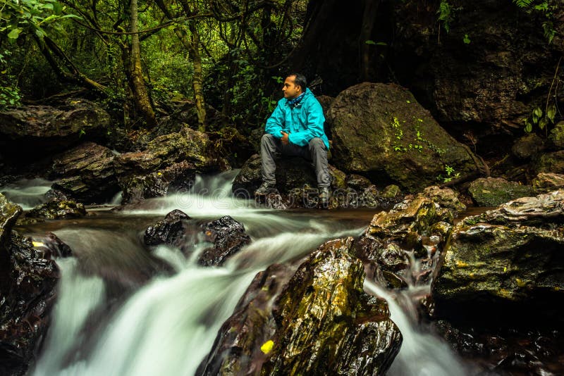 Man Watching the Nature at Waterfall Cover with Green Lush Forest Long ...