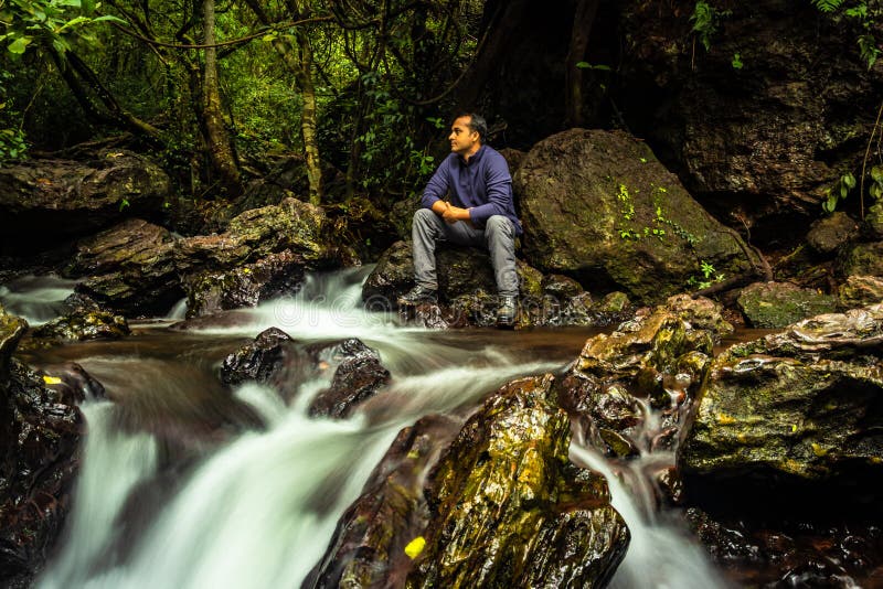 Man Watching the Nature at Waterfall Cover with Green Lush Forest Long ...