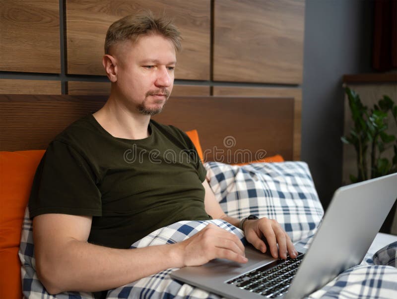 Man Watching News on Laptop in Morning Stock Image - Image of start ...