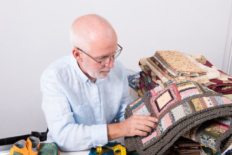 Man Watching the Patchwork in the Workshop Stock Photo - Image of ...