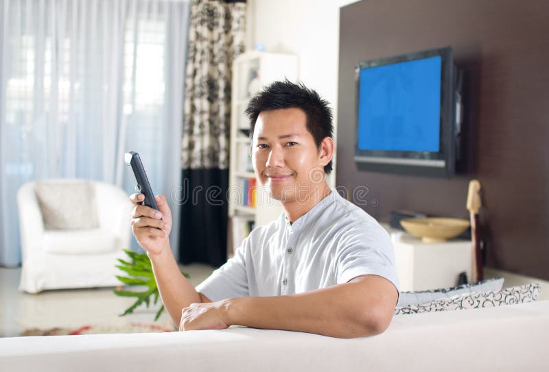 Man watching television stock image. Image of decoration - 10292167
