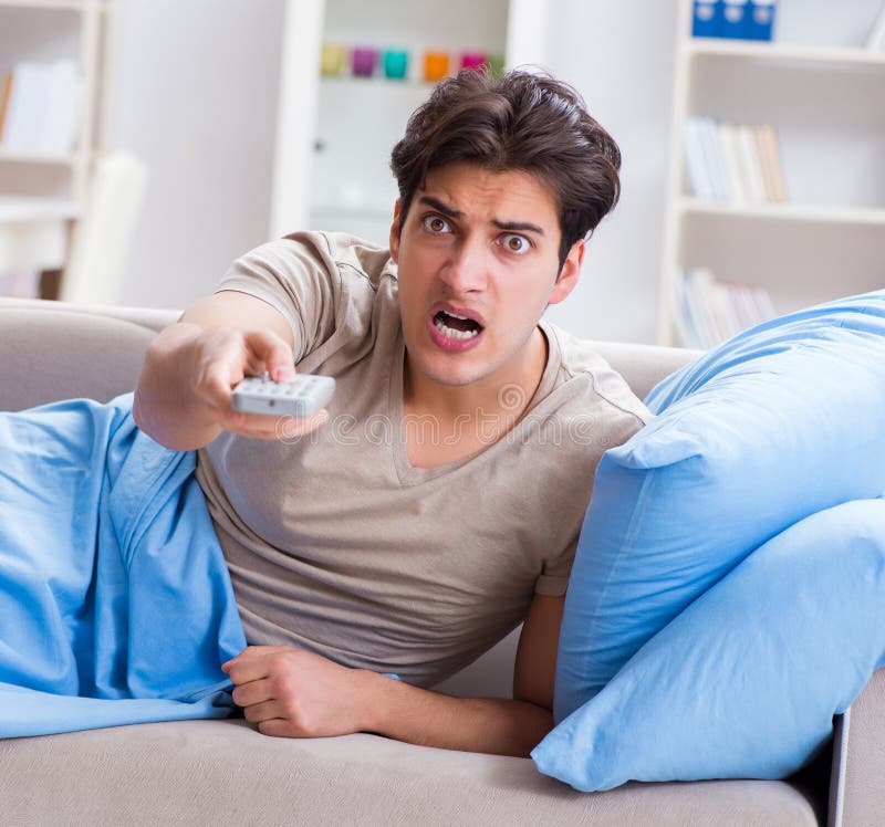 Man Watching Tv from Bed Holding Remote Control Unit Stock Photo ...