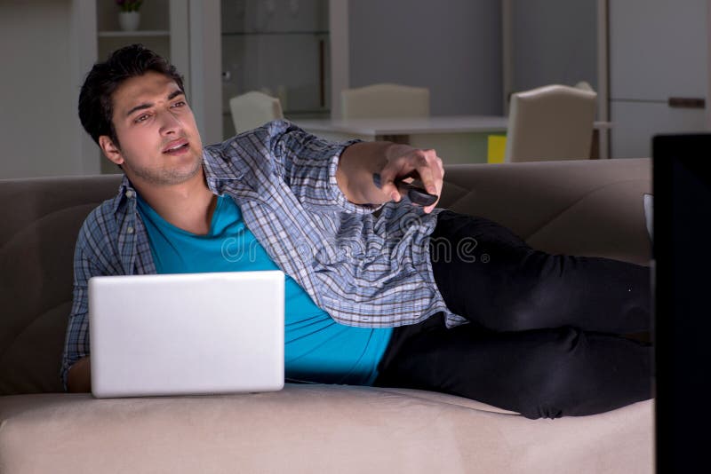 The Man Watching Tv Late at Night Stock Image - Image of lying, exam ...